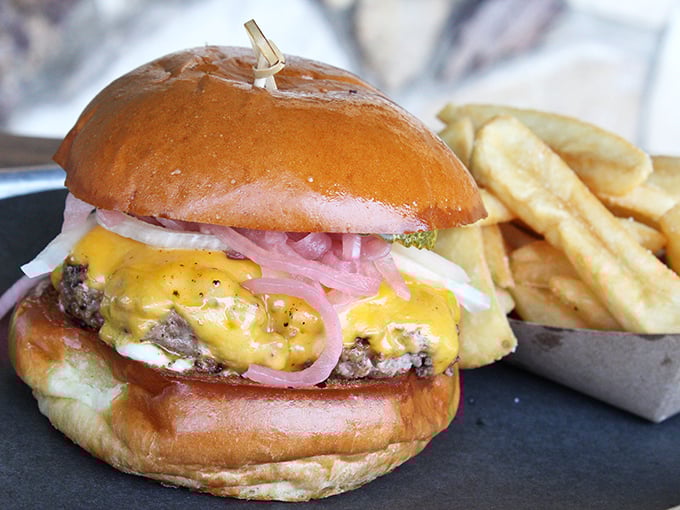 A cheeseburger that doesn't need to show off—it knows exactly what it is and executes perfectly, with fries standing by for backup.