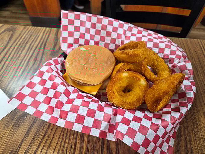 The classic doughburger with onion rings—a combination so perfectly executed it makes you wonder why you'd ever waste your time at those fancy burger joints.