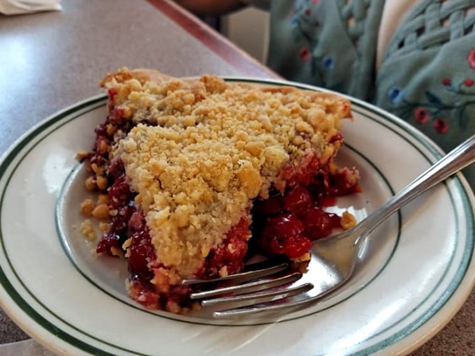 Cherry crumb pie that makes you understand why someone would climb a tree to pick the fruit—tart, sweet, and worth every calorie.