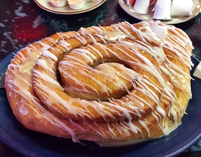 Not just a cinnamon roll—it's a spiral-shaped declaration of joy. The icing doesn't drizzle, it celebrates.
