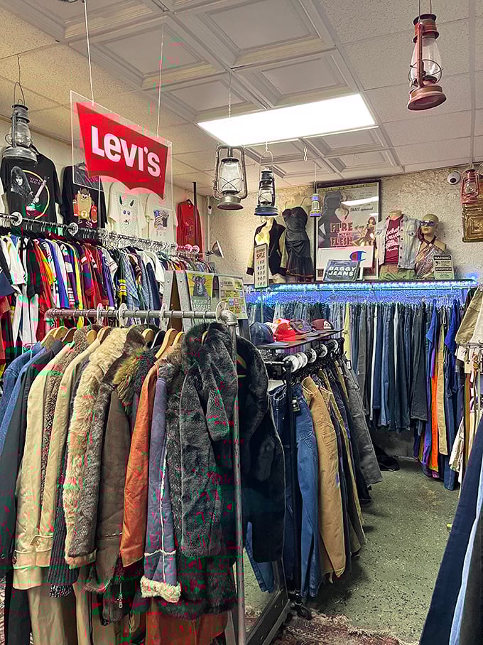 Vintage outerwear hanging like a timeline of fashion history. That perfect leather jacket or fur-collared coat is waiting for its second life.