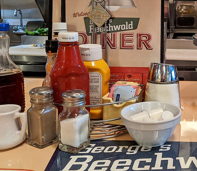 Condiment station organization that would make a librarian proud – everything has its place in this breakfast universe.
