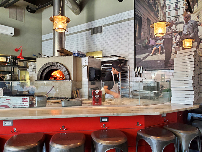 Where pizza magic happens – the fiery heart of Pizzeria Vetri. That wood-fired oven isn't just equipment; it's the restaurant's soul.