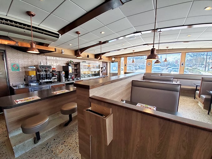 The counter seating—where diner magic truly happens. Front-row tickets to the breakfast show and the best place for solo diners to feel less alone.