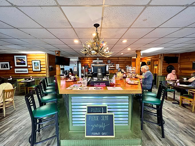 The counter offers front-row seats to the culinary show, where regulars exchange stories while watching breakfast magic unfold in the kitchen.