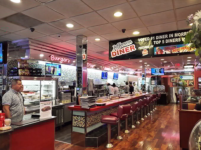The counter seating—where solo diners become regulars and the theater of short-order cooking unfolds before your eyes like a delicious Broadway show.