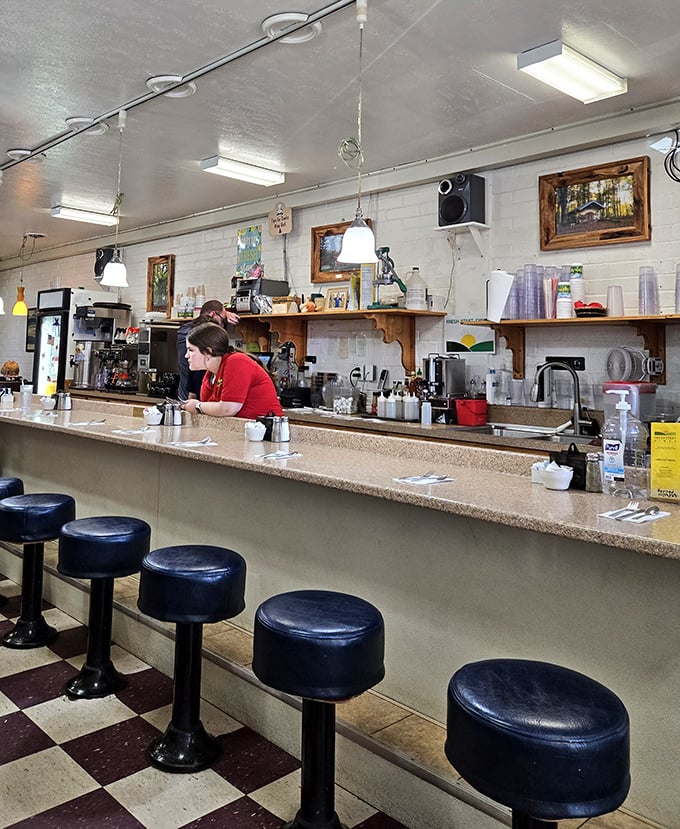 The counter seats aren't just the best spots in the house—they're front-row tickets to the breakfast ballet.