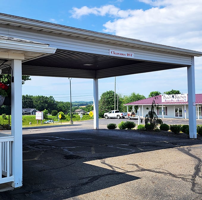 The covered entrance welcomes you like an old friend, promising that what awaits inside is worth every mile of your journey.