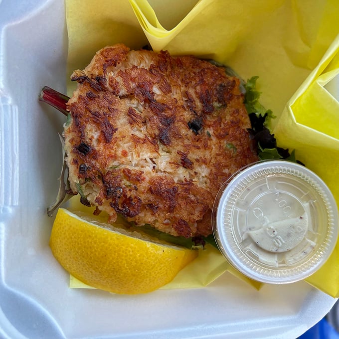 The perfect crab cake isn't just about what's in it—it's about what isn't. This golden-brown beauty lets the Dungeness speak for itself.