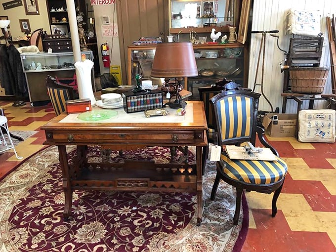 This elegant desk and striped chair pairing isn't just furniture—it's a statement piece waiting to transform your home office into a space Don Draper would approve of.