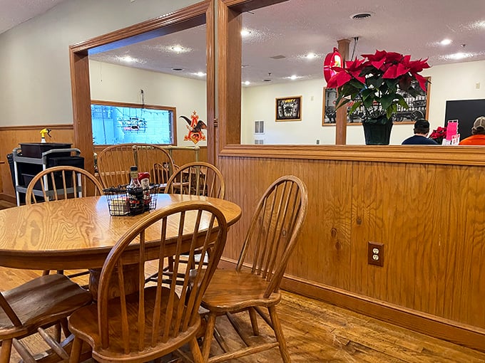 Wooden chairs, family-style tables, and holiday decorations create that "grandma's dining room" comfort that makes every meal taste better.