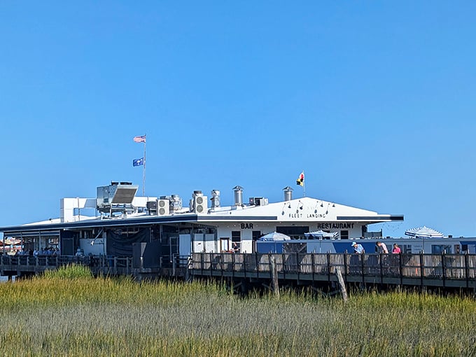 From a distance, Fleet Landing appears to float above the marsh grass—a white naval structure that traded military precision for culinary excellence.