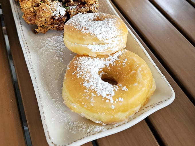 These aren't just donuts—they're pillowy portals to childhood joy that somehow taste even better when you're old enough to pair them with bourbon.