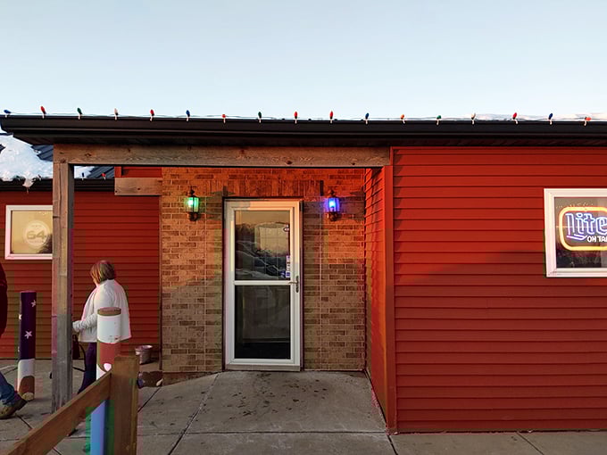 The entrance to flavor paradise—simple, unpretentious, and welcoming. Those colored lights aren't just decoration; they're a promise of good times ahead.