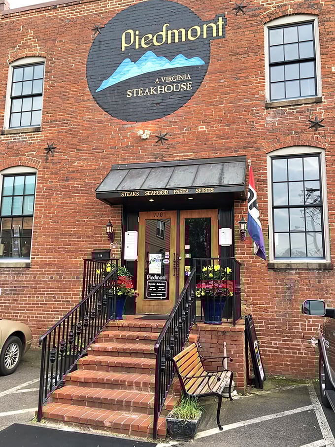 The entrance promises what the interior delivers—a Virginia steakhouse experience where Blue Ridge Mountain inspiration meets downtown Culpeper charm.