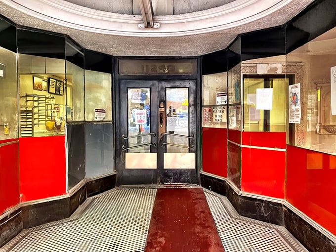 The entrance beckons like a portal to a sweeter dimension. That red-trimmed doorway has witnessed generations of Chicagoans seeking comfort in fried dough.