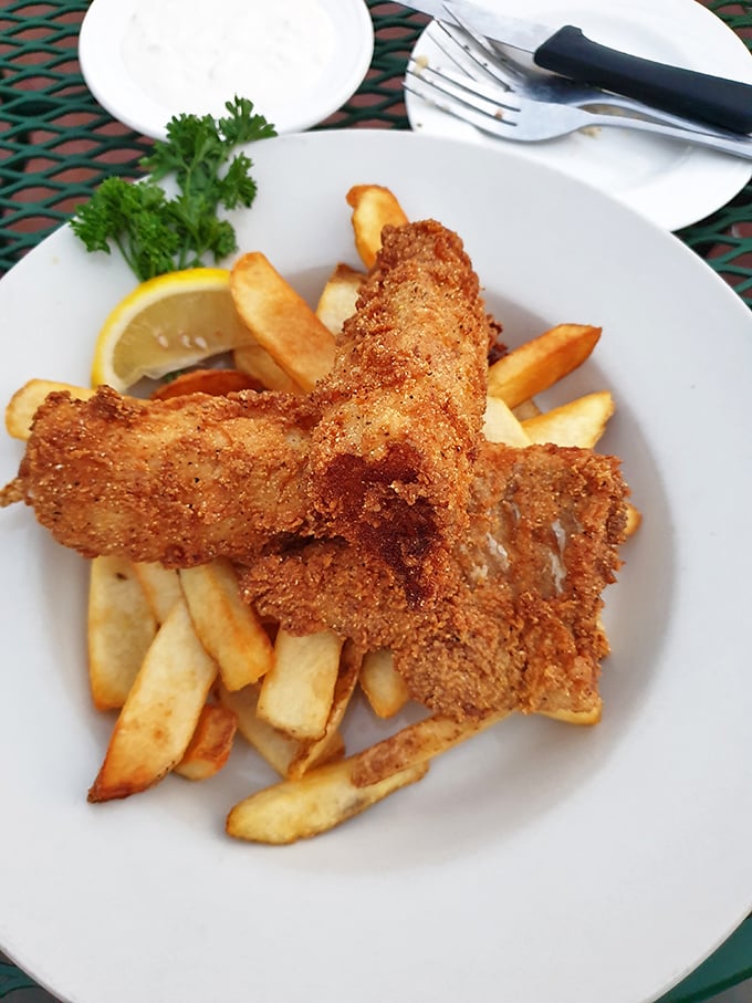 Golden-battered fish atop hand-cut fries—sometimes the classics are classics for a reason, and Charlie's version reminds us exactly why.
