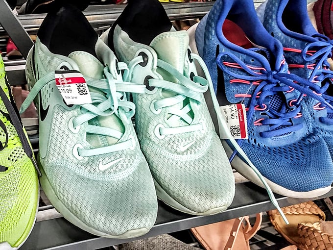 Barely-worn athletic shoes lined up like hopeful contestants – Nike, Adidas, and their friends waiting for their second wind with a new owner.