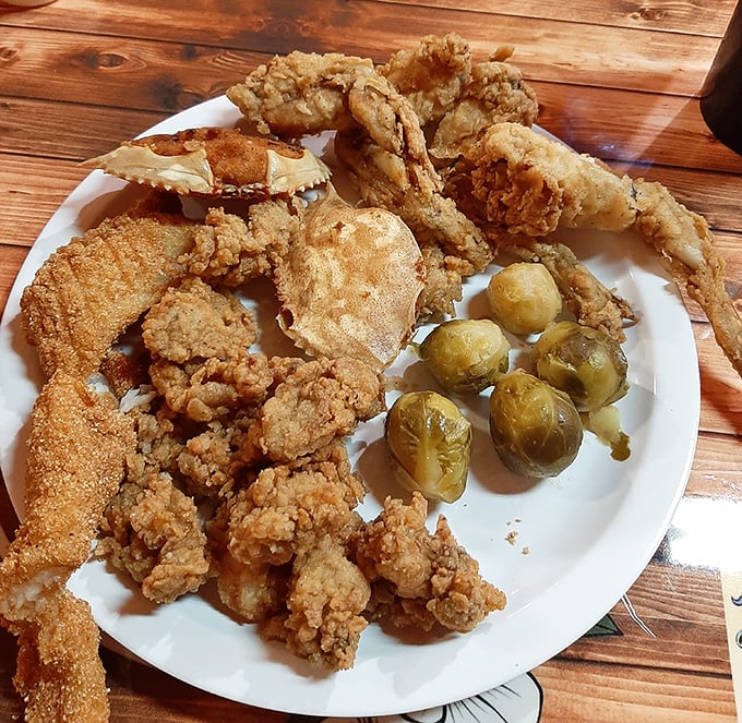When the Gulf of Mexico meets Southern frying techniques, magic happens. This seafood platter isn't just a meal—it's coastal Alabama on a plate.