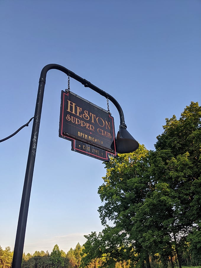 The hanging sign announces "Open Nightly"—two beautiful words that promise access to carnivorous delights seven days a week. Hallelujah.