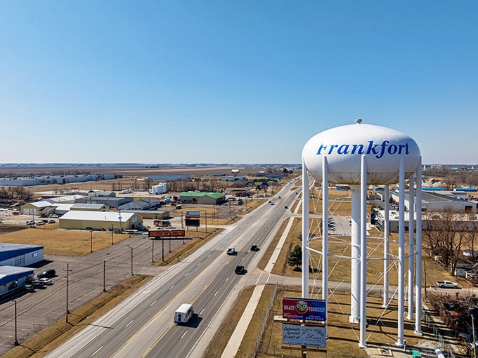 That water tower isn't just holding H2O—it's announcing "Frankfort" to travelers who might just find their retirement dollars stretch further than that endless Indiana horizon.