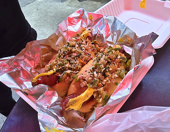 Not just any hot dog—a Korean-inspired creation that makes you wonder why all hot dogs don't dress this way. Fusion food that actually makes sense.