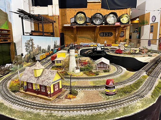 The intricate model railroad layout features miniature buildings, landscapes, and trains—a small world that inspires big imagination in visitors of all ages.