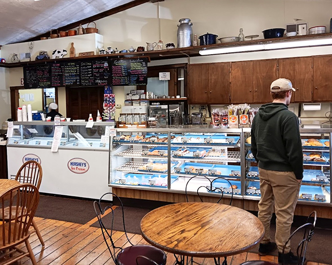 The bakery counter—where life-changing decisions are made daily. "Just one" becomes "maybe three" faster than you can say "diet starts tomorrow."
