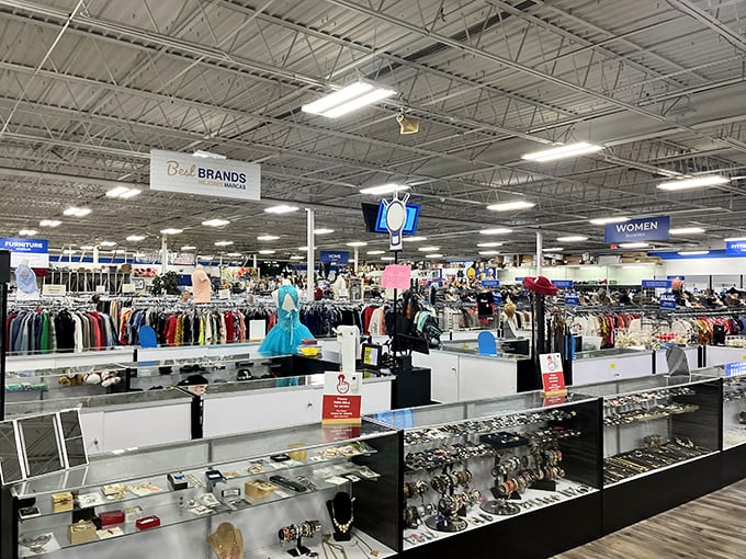 Department store organization meets thrift store prices. The jewelry counter gleams with possibility while clothing sections beckon in the background.