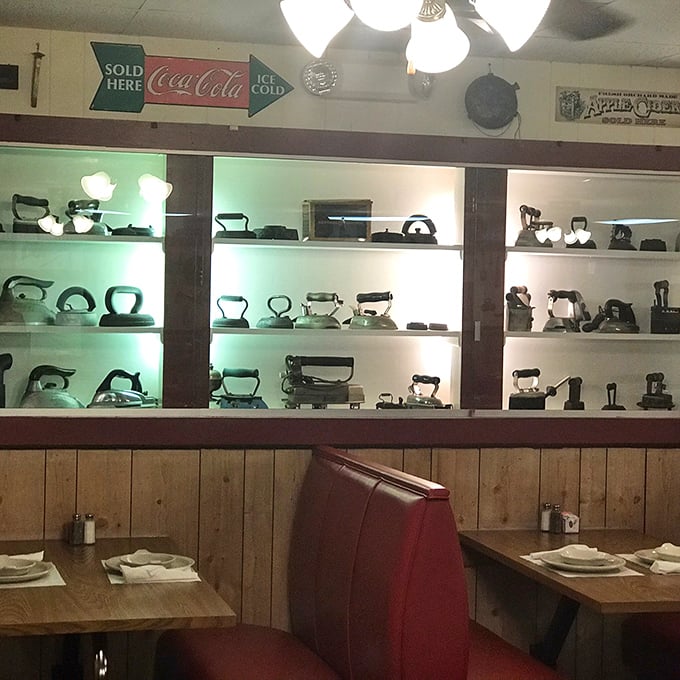 Vintage irons displayed like museum pieces – because at Monte Ne Inn, even the décor celebrates the honest craftsmanship of a bygone era.