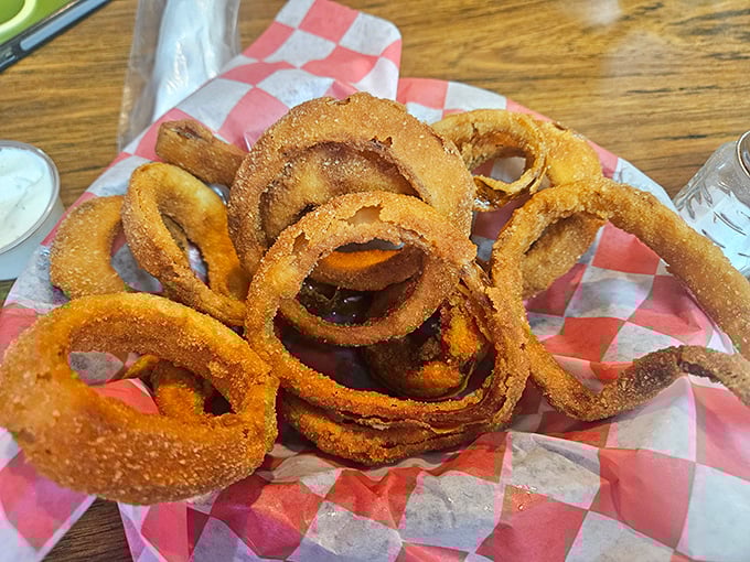 Golden, crispy onion rings that shatter with each bite—the perfect sidekick to smoky barbecue or delicious all on their own.