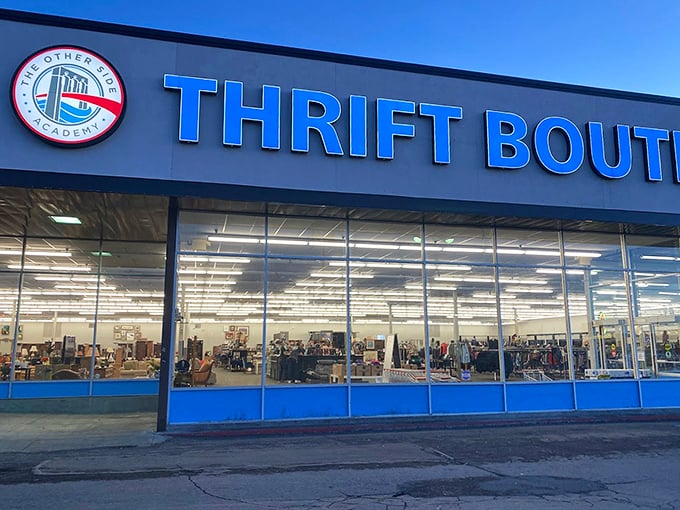 The exterior at dusk—when the blue signage glows with promise, like a beacon guiding bargain hunters safely to shore after a day of retail disappointments.