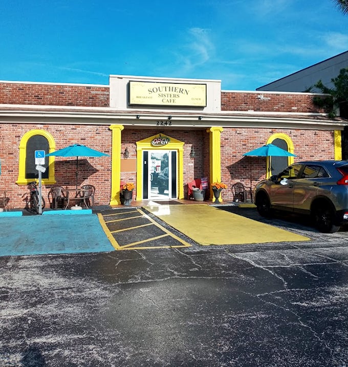 Blue sky, bright yellow trim, and colorful umbrellas – the cafe's exterior is as cheerful as the food inside is comforting. Florida sunshine in architectural form.