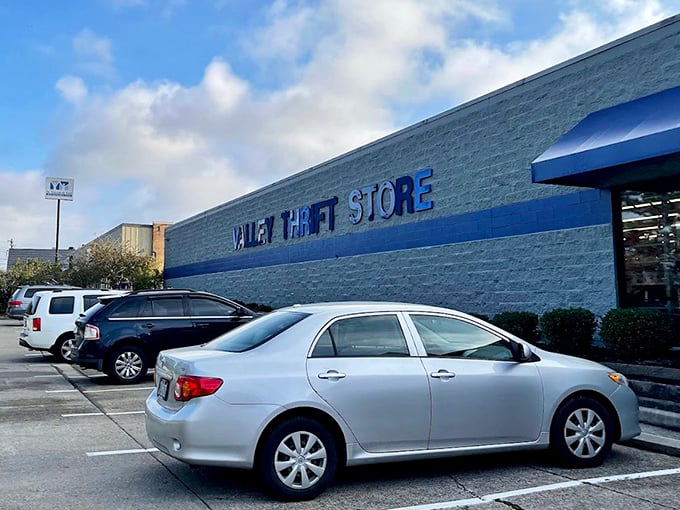 The unassuming exterior hides a warehouse of wonders within—like a blue-painted portal to an alternate dimension where everything costs less.