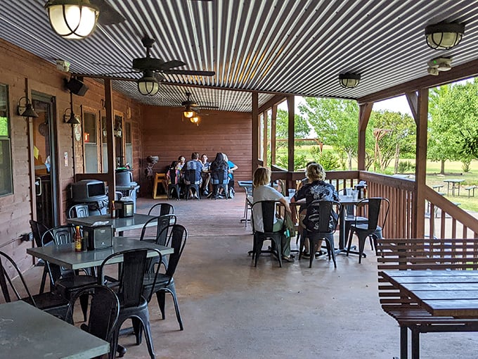 The covered porch offers al fresco dining with a side of Texas breeze – perfect for when you need to contemplate ordering that second piece of pie.