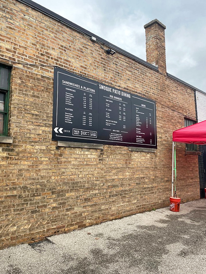 The outdoor menu board—for those who need to mentally prepare before committing to the glorious meat sweats that await inside.