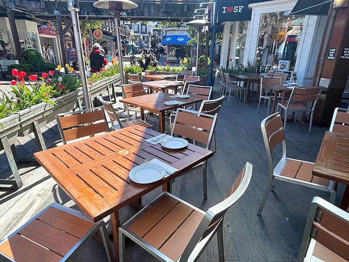 Outdoor dining with the perfect breeze off the bay. These tables have witnessed countless first dates, celebrations, and "I can't believe how good this is" moments.