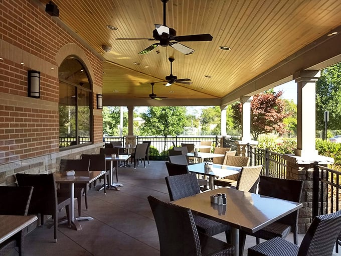 Outdoor dining perfection. This patio invites you to linger over lunch while gentle ceiling fans keep the Ohio summer at bay.