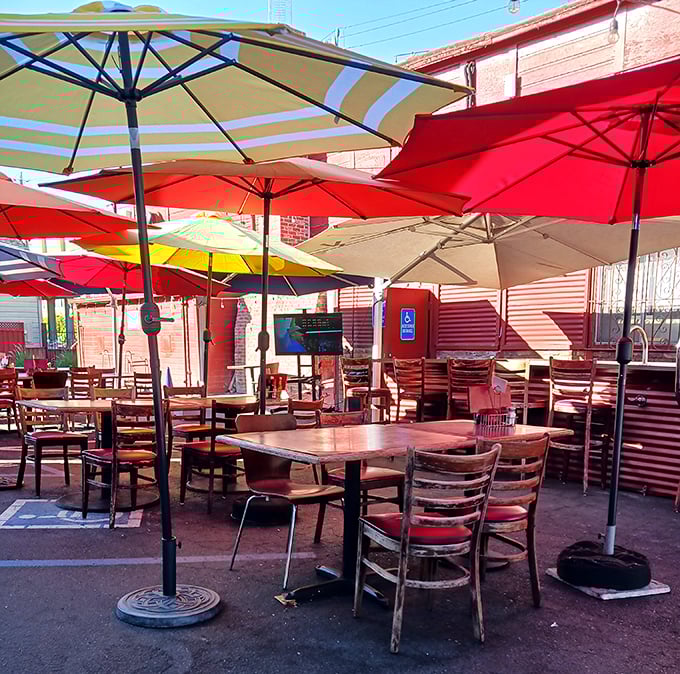 The outdoor seating area offers a colorful umbrella oasis—California sunshine and barbecue proving once again they're a match made in culinary heaven.