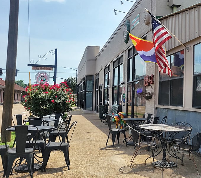 The outdoor seating area—where the Mississippi sunshine meets the shade of barbecue heaven, and every breeze carries the promise of smoked perfection.