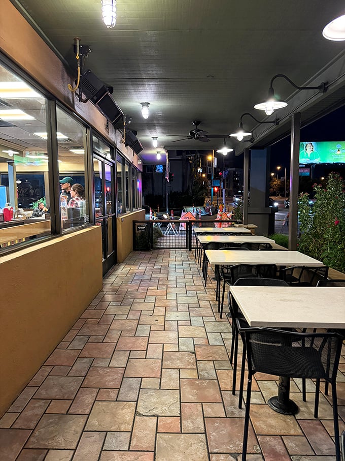 The outdoor patio—where Pasadena nights become the perfect backdrop for conversations fueled by good food and the gentle hum of Colorado Boulevard.