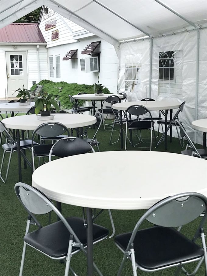 The outdoor seating area—where summer meals feel like impromptu picnics, minus the ants and with all the comfort of home cooking.