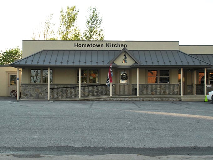 Hometown Kitchen's exterior doesn't shout for attention—it doesn't need to. The parking lot full of local license plates tells the real story.