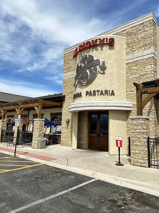 The welcoming exterior beckons like an old friend on a sunny day, promising that inside these stone walls, comfort food nirvana awaits.