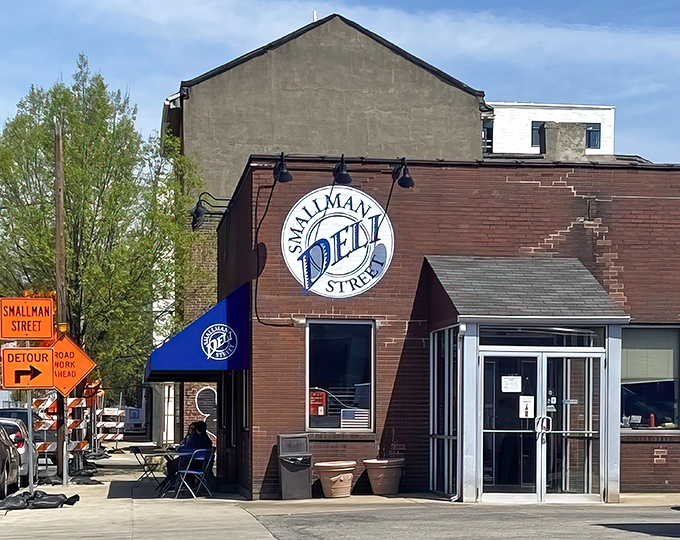 The exterior view – an unassuming corner spot that proves you should never judge a deli by its brick facade.