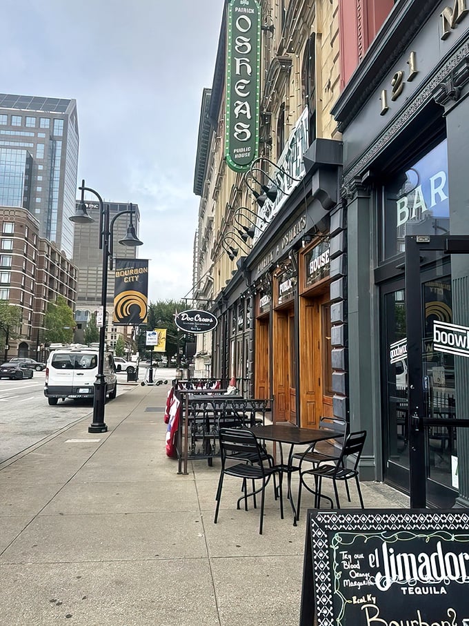 Downtown Louisville's historic architecture provides the perfect backdrop for sidewalk dining. Urban energy meets Southern leisure at this corner.