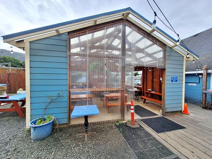 A seafood sanctuary with transparent walls. This covered outdoor seating area lets you enjoy ocean bounty while staying connected to coastal breezes.