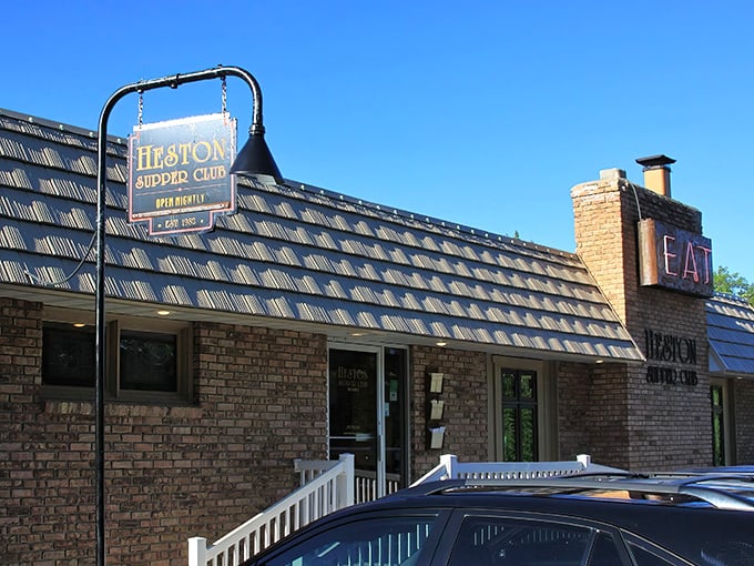 The exterior's distinctive brick chimney and welcoming signage beckons hungry travelers to discover what locals have known for years now.