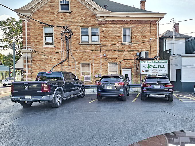The humble parking lot – where anticipation begins and where you'll later waddle back to your car in a state of steak-induced bliss.