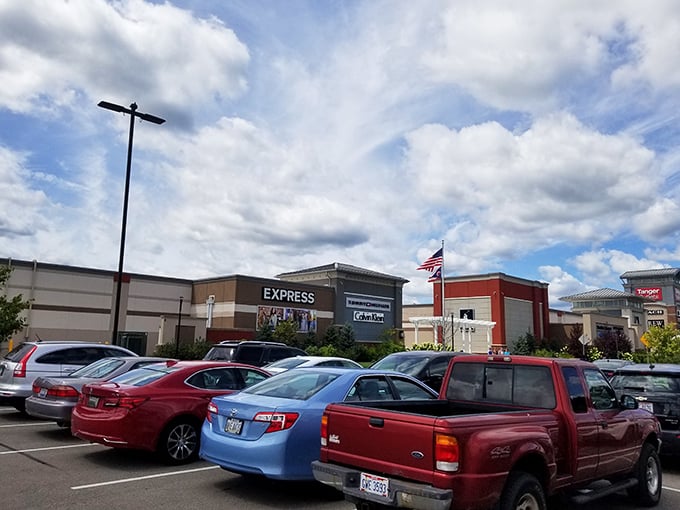 Even the parking lot has a certain charm—like the starting line of a race where everyone wins designer deals. That Express storefront is just the beginning of the adventure.